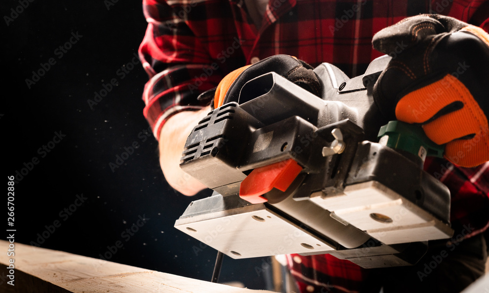 Handsome young man using wood sanding machines belt sander Stock Photo ...