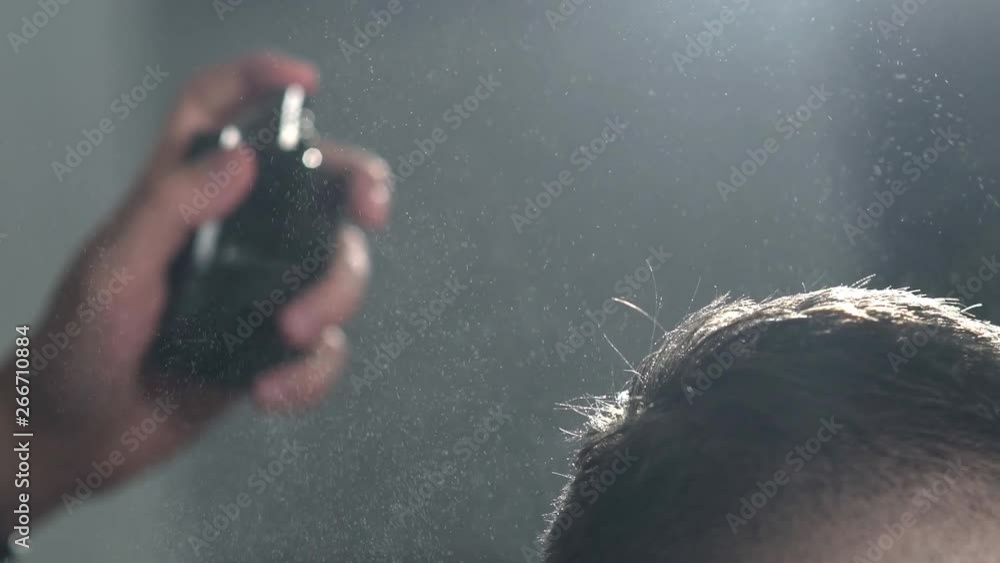 Vídeo do Stock: Barber combs his hair to a young guy with a beard and ...