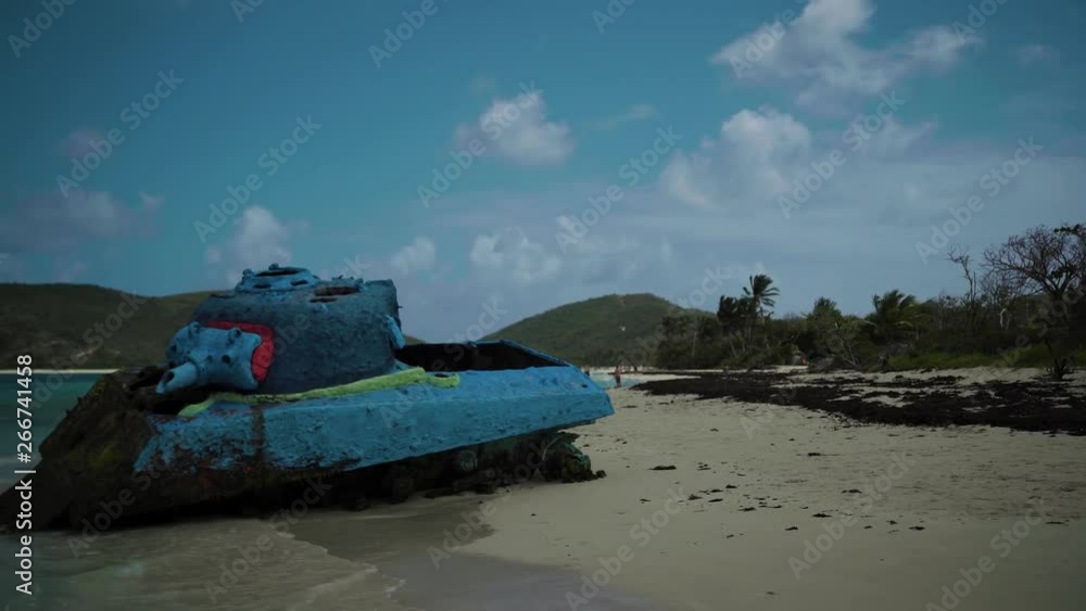 Beautiful bright blue and red old rusted tank that lies on Flamenco ...