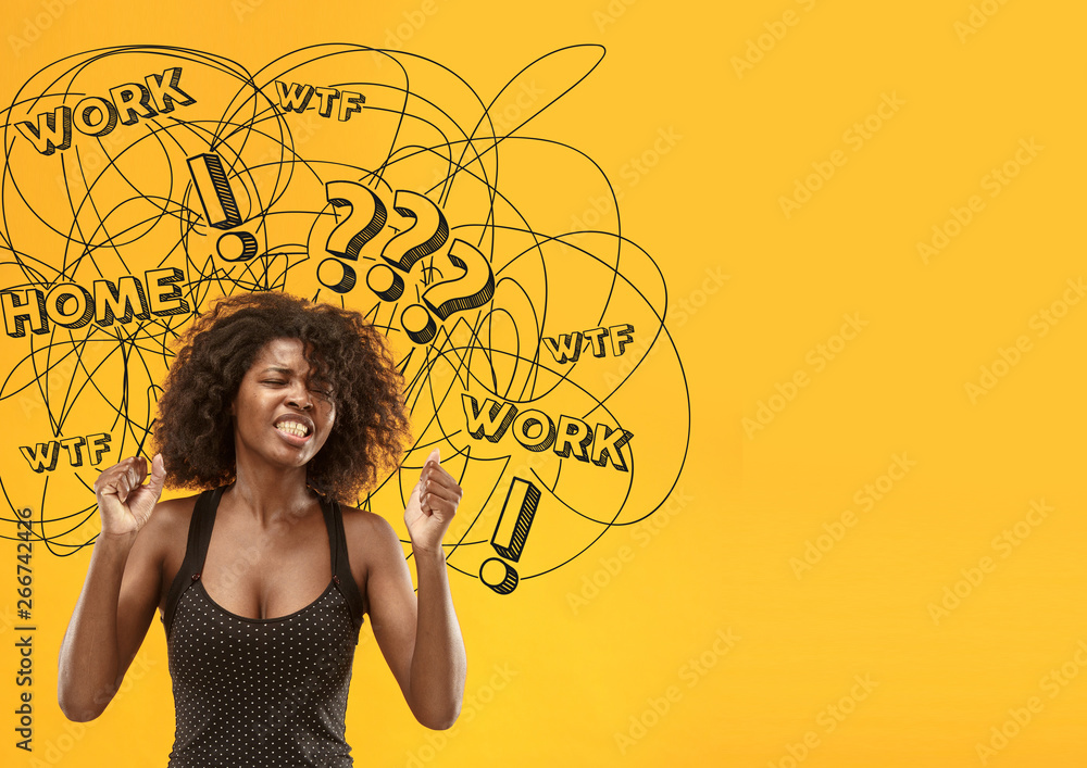 Young african-american woman with mixed thoughts against yellow ...