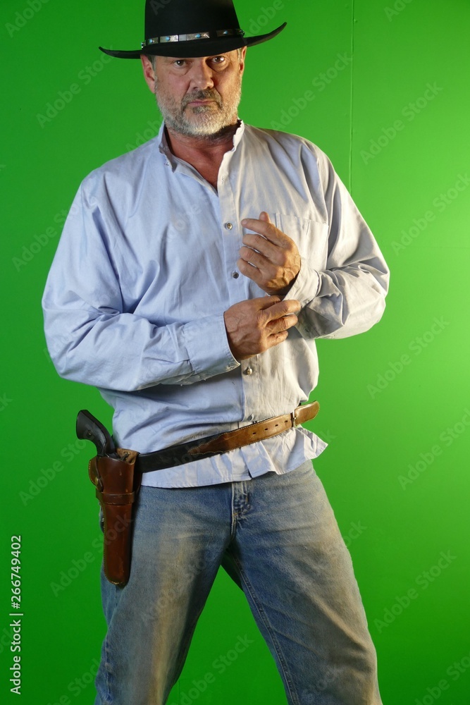 cowboy gunfighter black hat Colt revolver Stock Photo | Adobe Stock