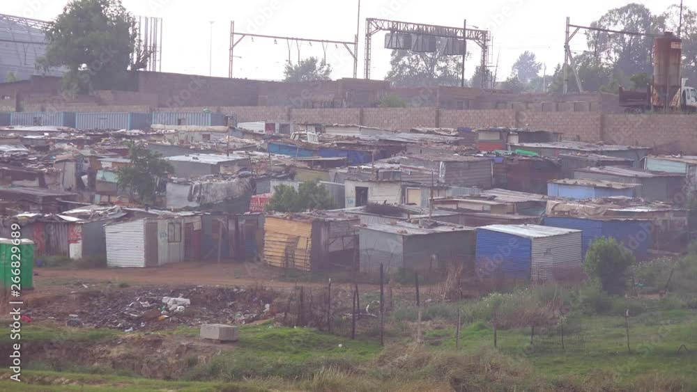 Establishing shot of slums of extreme poverty in Soweto Township, South ...