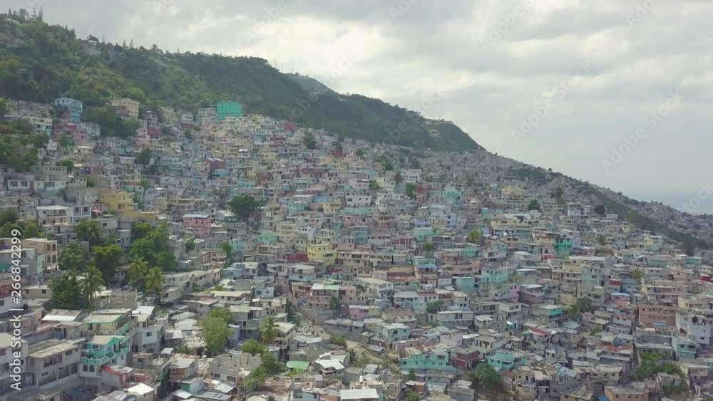 Amazing aerial slowly rising over the endless slums, favelas and shanty ...