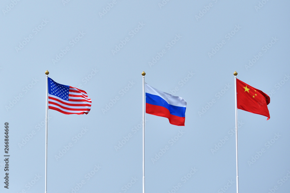 Beautiful and bright flags of the Russian Federation, China and the ...