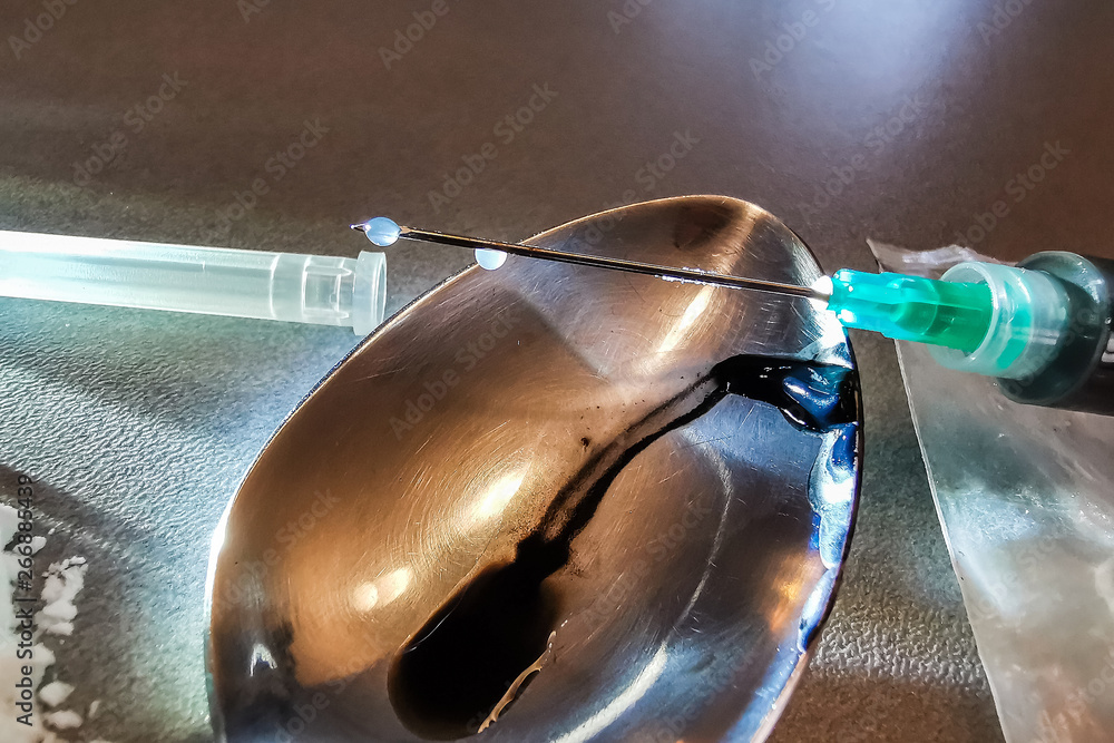 Hard crystal drugs and prohibited substances, syringes, cooked heroine ...