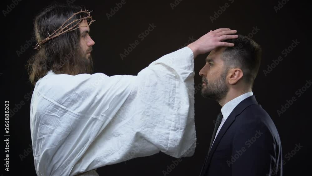 Savior putting hand on male head, spiritual guide, religious love ...