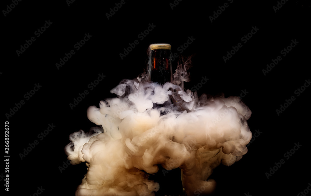 Liquid water explosions surrounding beer bottle. Underwater liquid ...