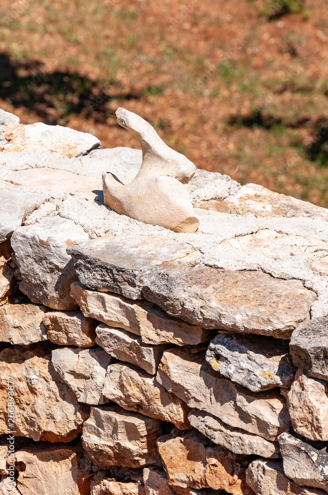 Typical dry stone wall of Alberobello, Italy. The picturesque village ...