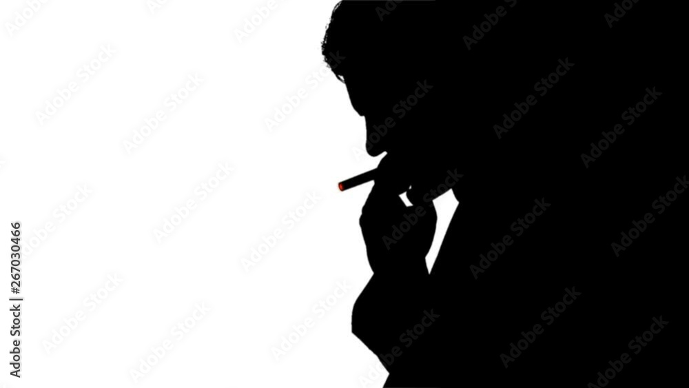 Silhouette of smoking man with burning cigarette.Silhouette of a man ...