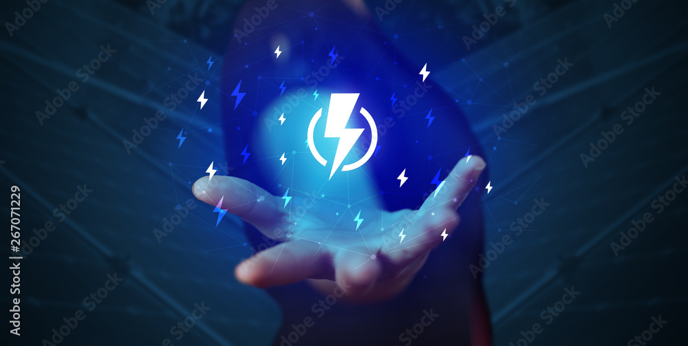 Hand in suit holding lightning bolt on his hand, green environment ...