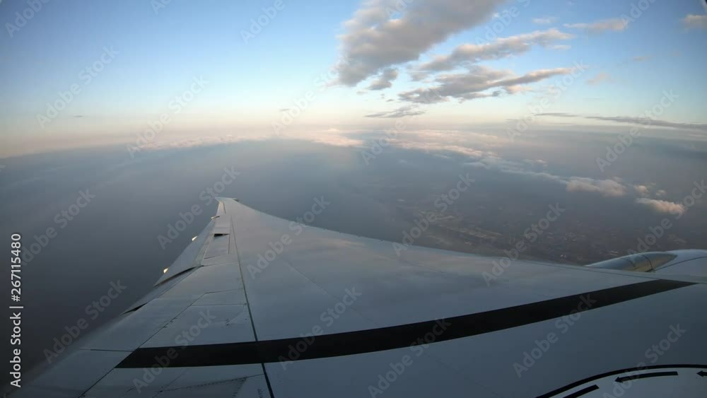 4K, Aerial view of beach in Taiwan island. See the wing of a plane as ...