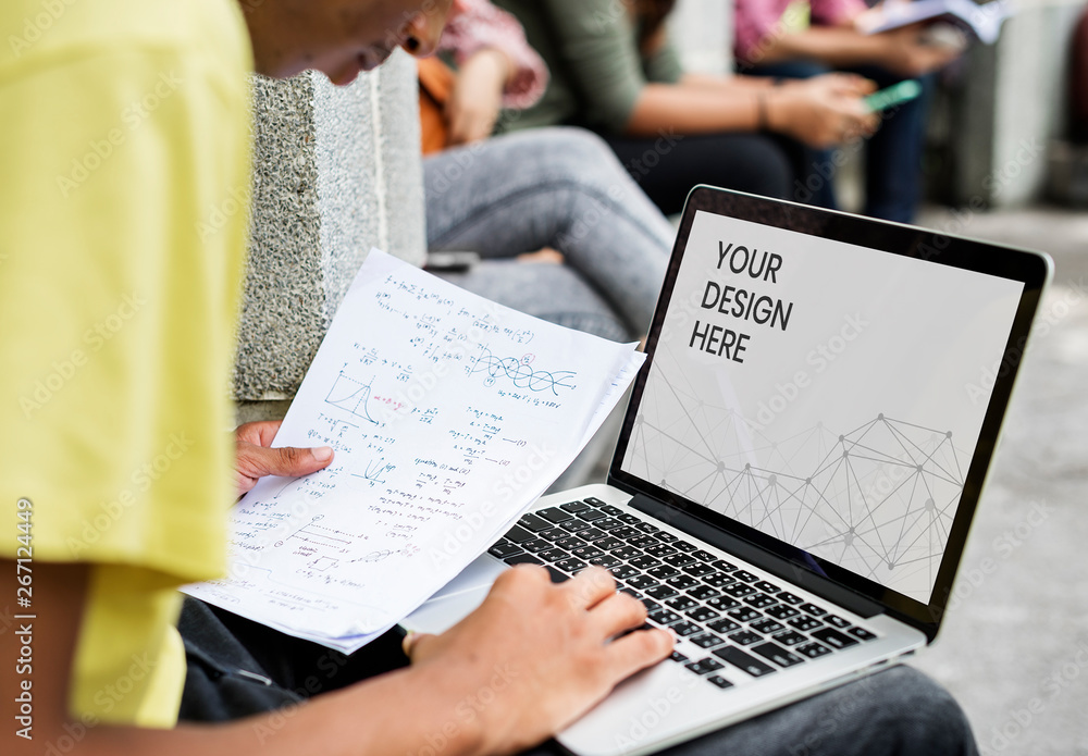 Modelo de Student Doing Homework and Using Laptop Mockup do Stock ...