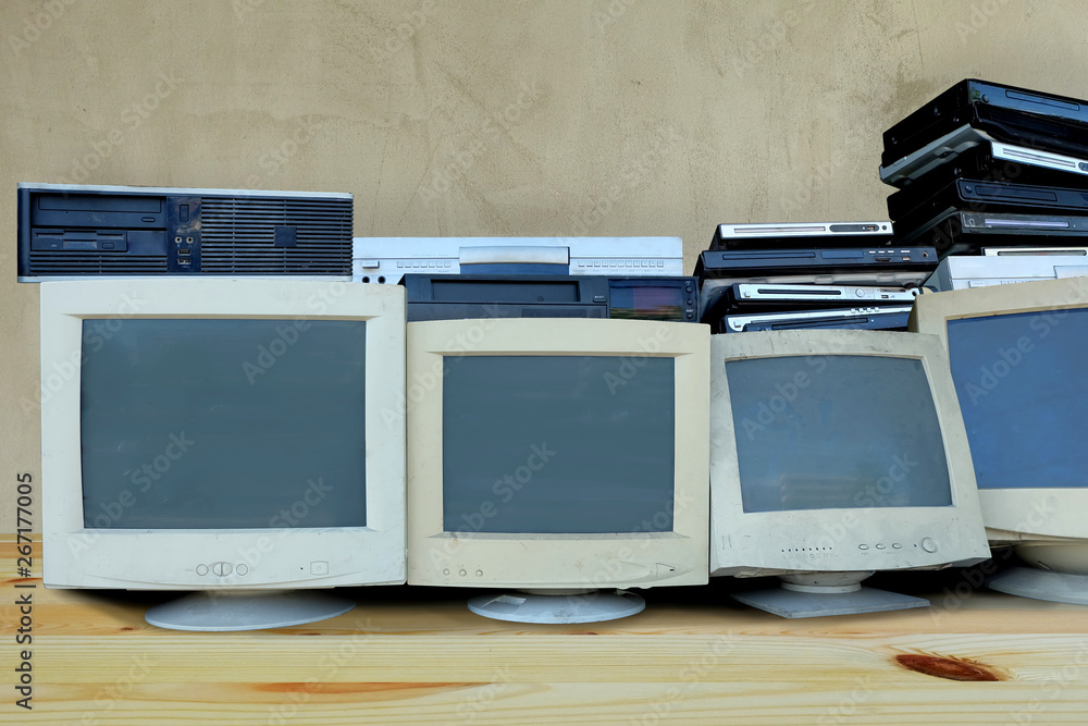Garbage dump, monitor computer and old electrical appliances that are ...