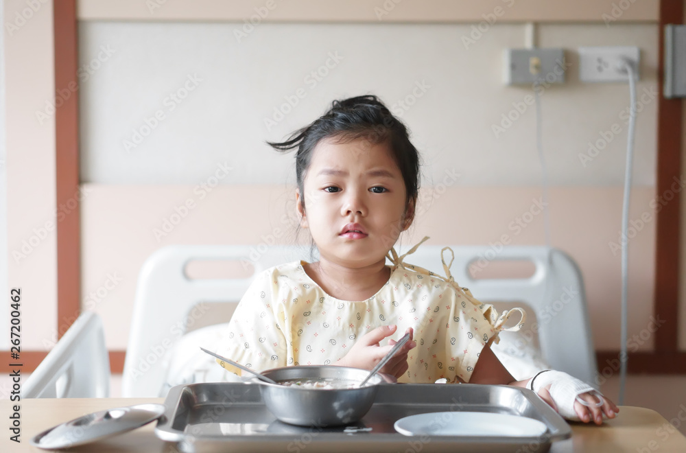 Asian child patient or kid girl Influenza A sick and sad with cry to ...
