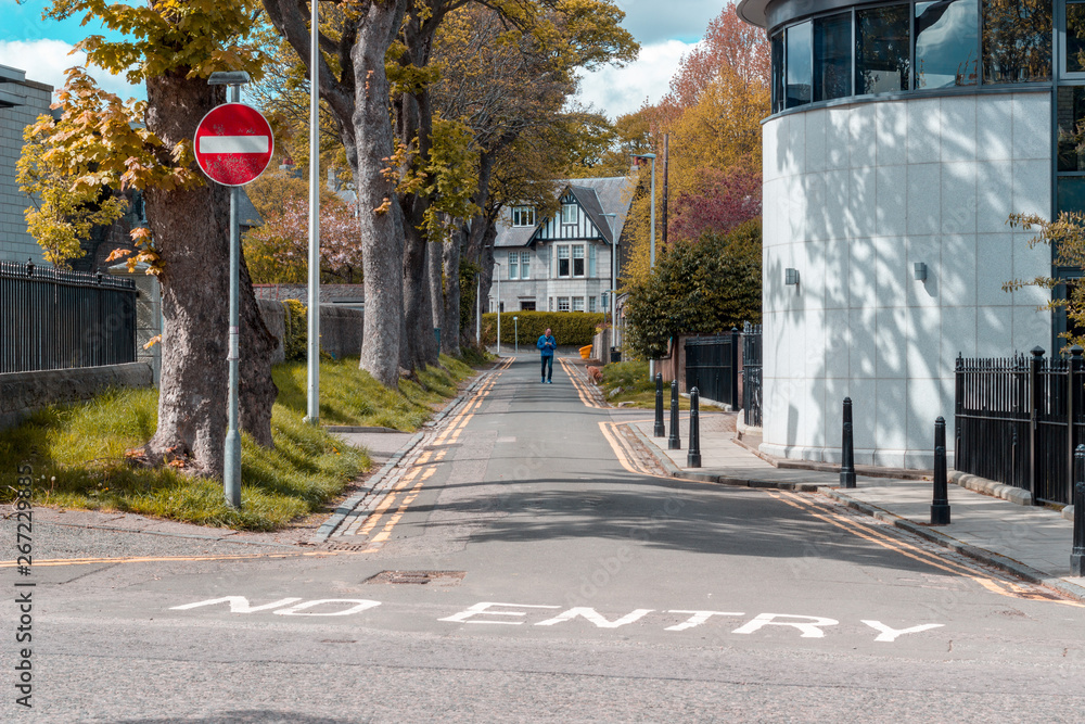 Street with "no entry" marking leading to a house Stock Photo | Adobe Stock