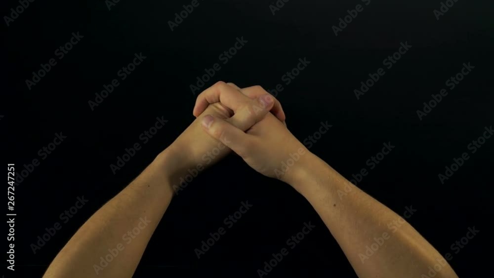 Hands folding then giving up.Two hands clasping then giving up in ...