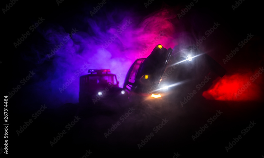 Police car chasing a car at night with fog background. 911 Emergency ...