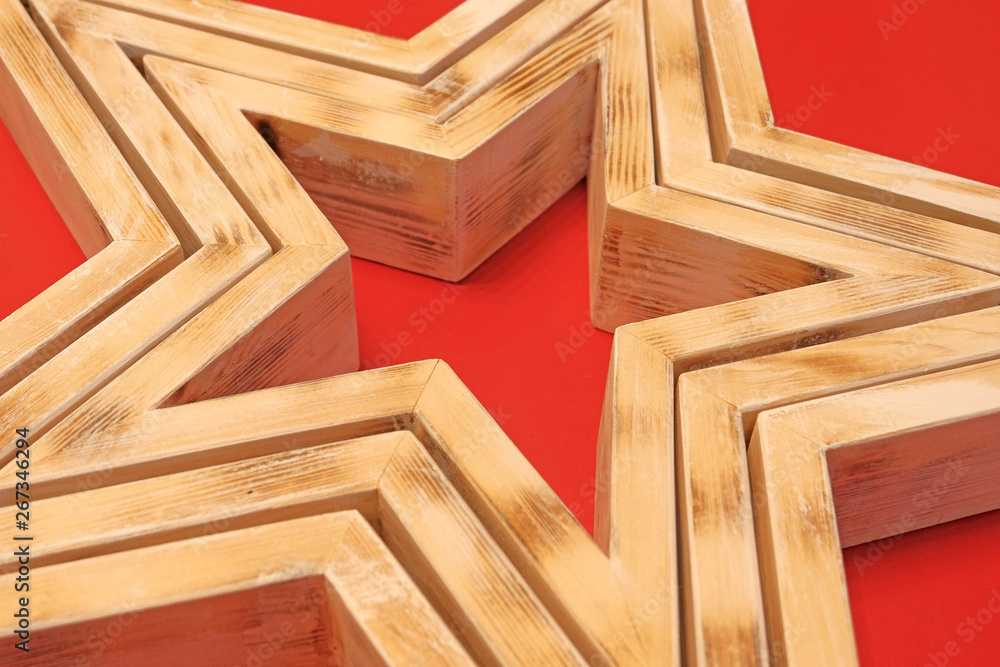 Star, the wooden figure. Three star shapes stacked together like a ...