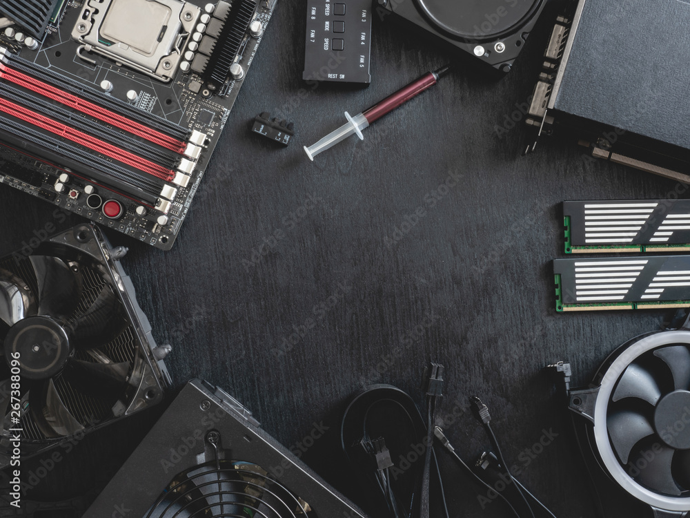 top view of computer parts with harddisk, ram, CPU, graphics card, and ...