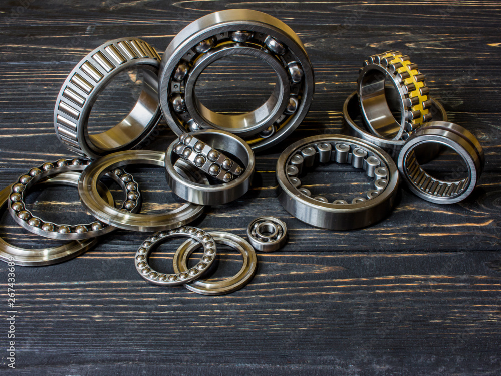 On a black background all types of bearings (Ball radial, roller radial ...