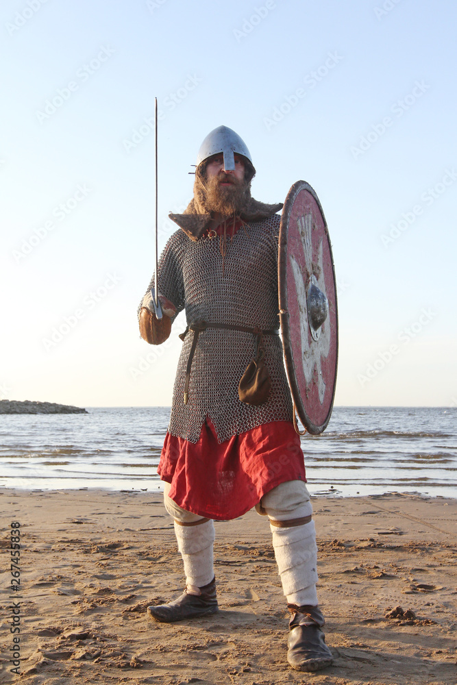 Slavic warrior with sword Stock Photo | Adobe Stock