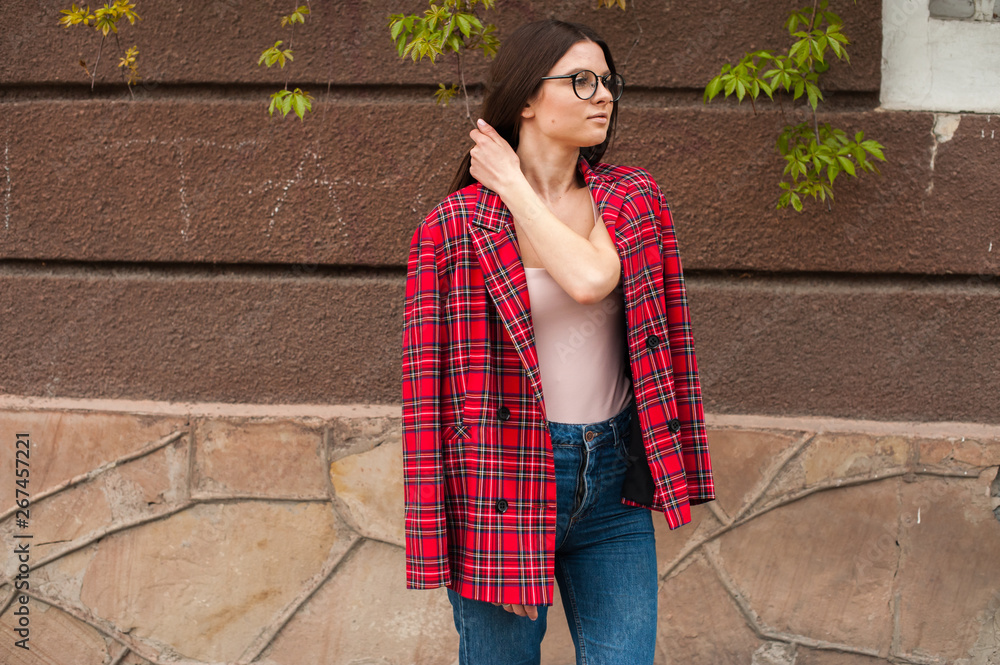beautiful girl in a red jacket Stock Photo | Adobe Stock