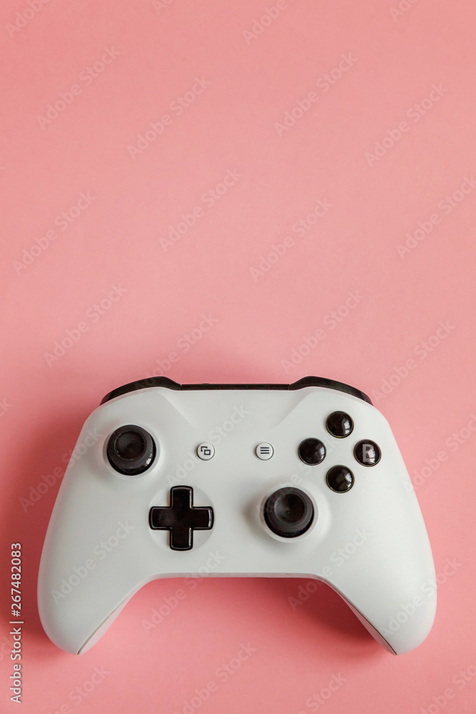 White joystick gamepad, game console on pastel pink colourful trendy ...