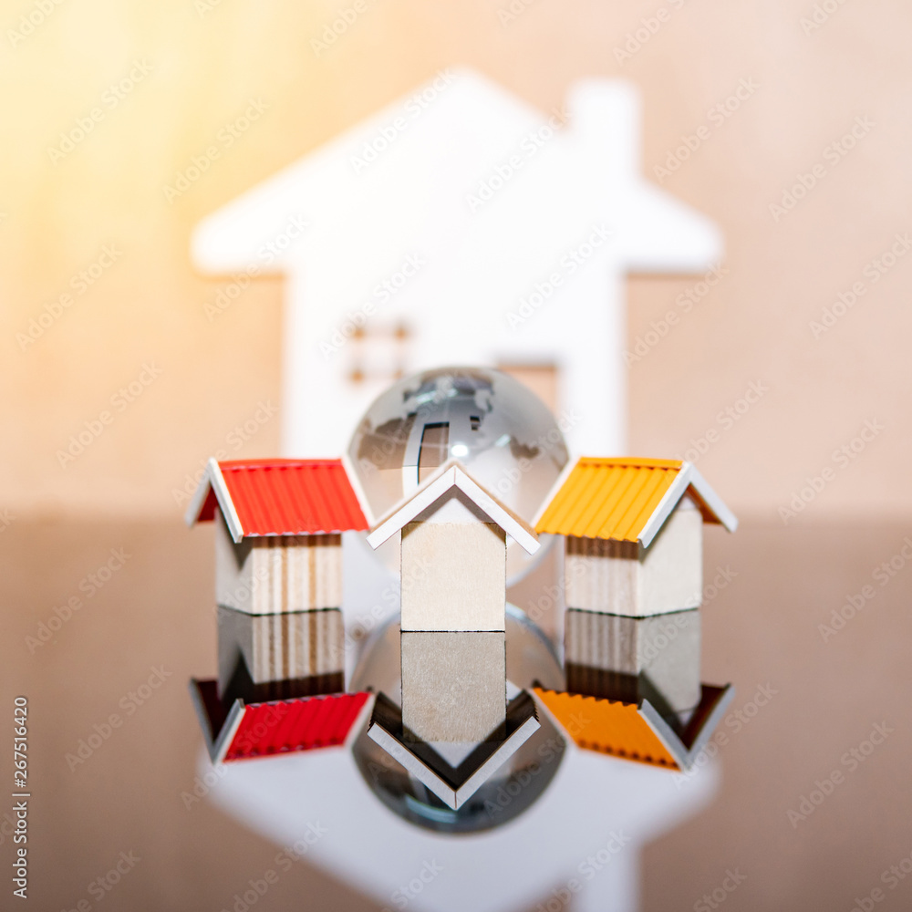 Global real estate or property investment concept. Wooden house models ...