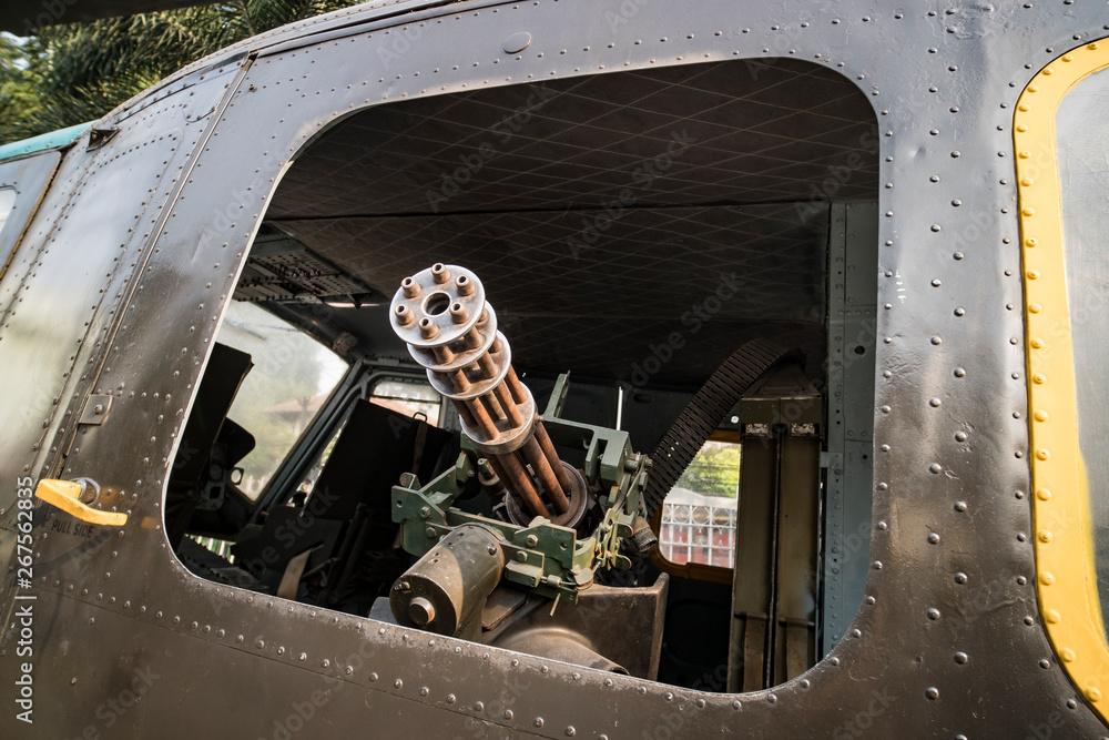 Minigun mounted inside a Huey helicopter Stock Photo | Adobe Stock