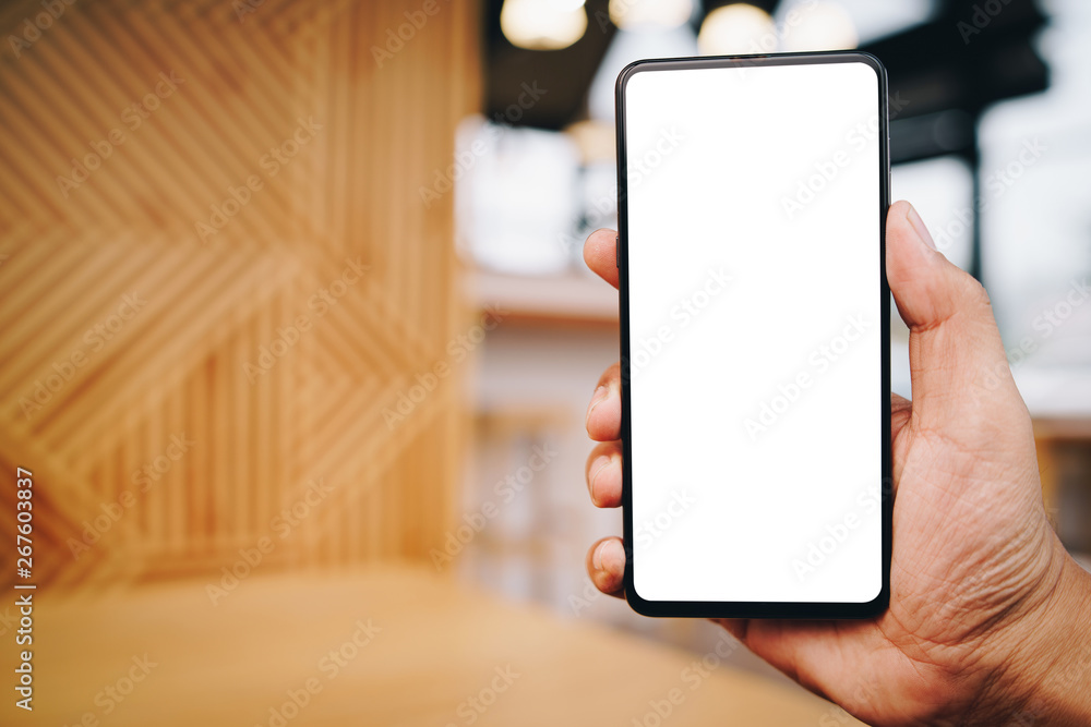 Man using Smartphone. Blank screen mobile phone for graphic display ...