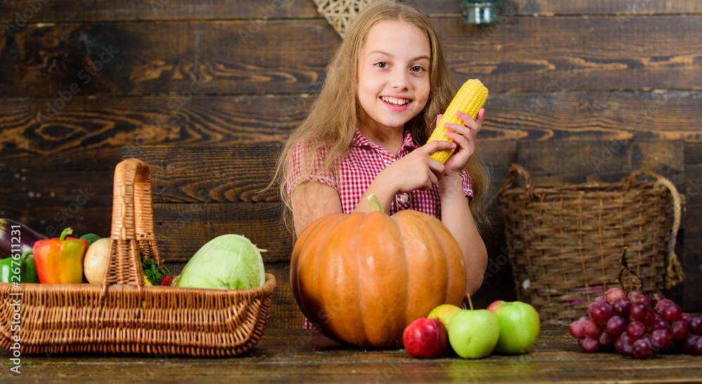 Kid farmer with harvest wooden background. Farm themed games and ...