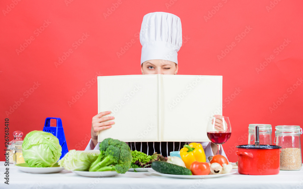 Offering balanced menu. Adorable woman learning restaurant menu for a ...