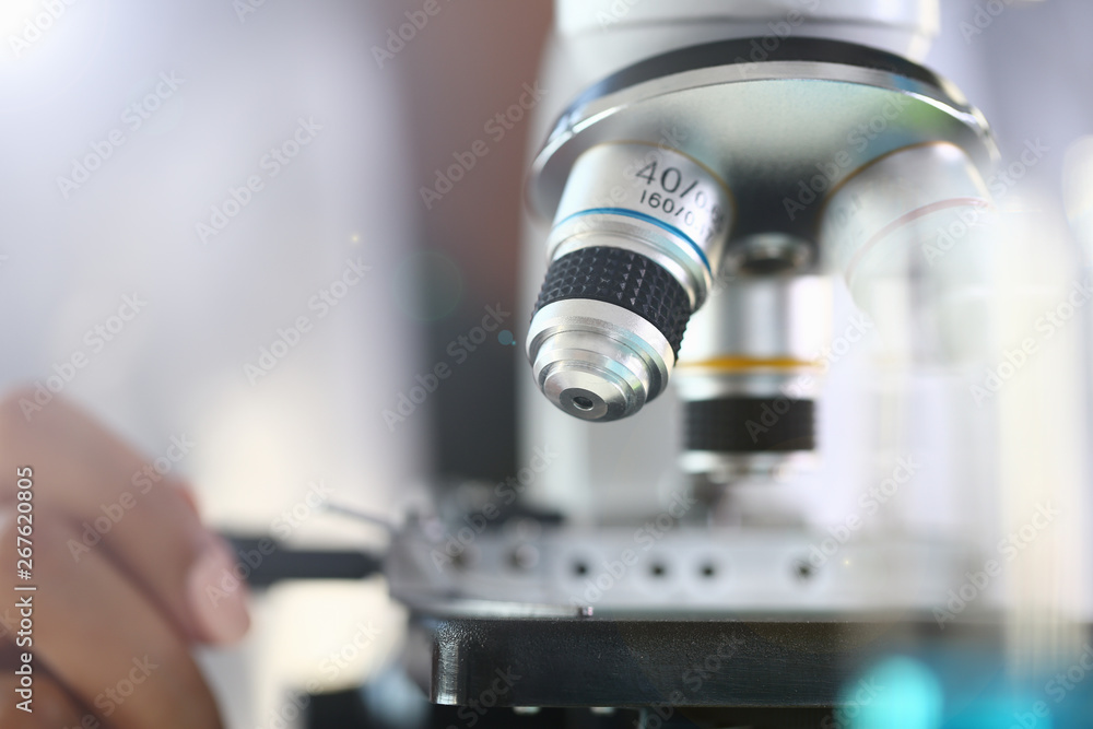 Head microscope on the background laboratory is a study human biology ...
