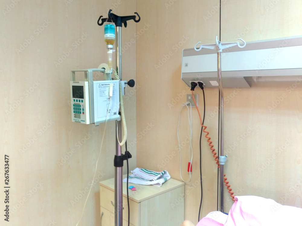 Infusion pump in the hospital . Automatic infusion pump . Saline ...