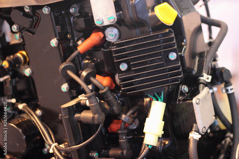 Fotka „Boat outboard motor ignition system - CDI controller and high ...