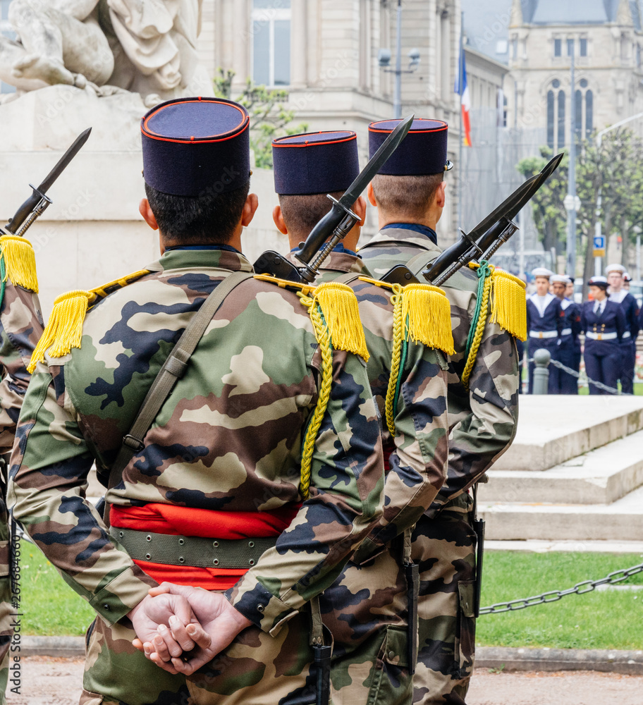 Rear view of soldiers at ceremony to mark Western allies World War Two ...