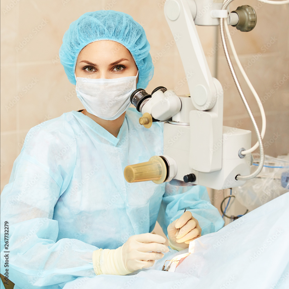 Ophthalmology laser microscope operation. Doctor in clinic. Patient eye ...