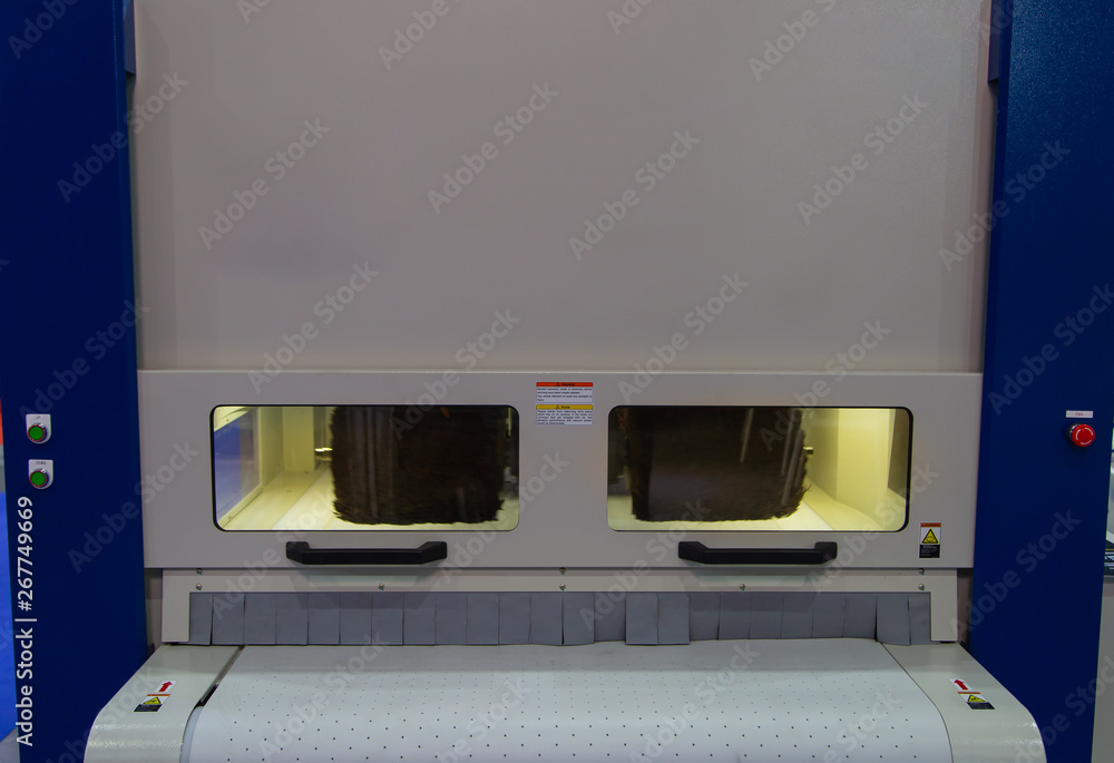 Deburring metal sharp edge and rounding machine. Industrial manufacture ...