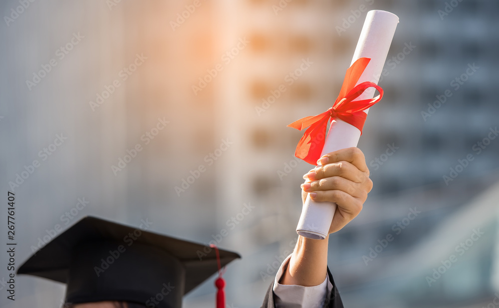 graduation certificate in her hand Stock Photo | Adobe Stock