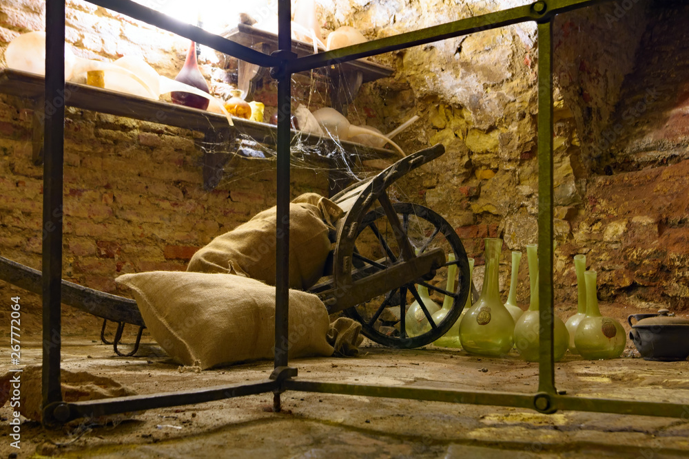 Medieval alchemist’s laboratory interiors: bricked vault equipped with ...