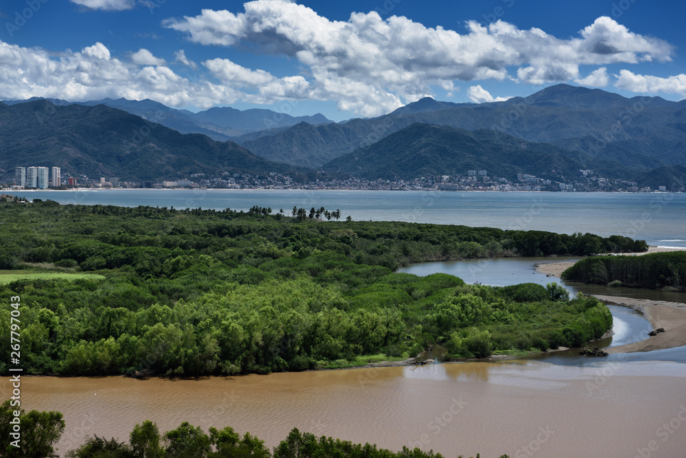 Puerto Vallarta between Banderas Bay and muddy Ameca river and Sierra ...