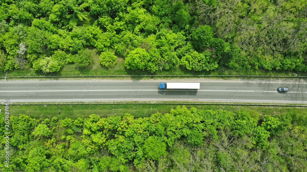 Wagon driving on the highway, aerial. Transport logistics background ...