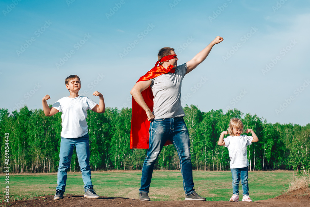 super-dad with son and daughter in the summer in nature Stock Photo ...