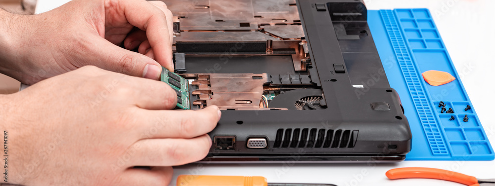 Engineer makes dismantling of RAM for disassembling and repairing a ...