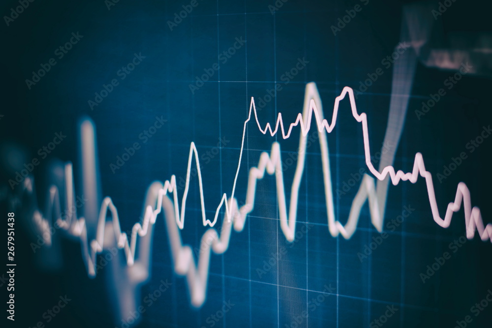 Economic graph with diagrams on the stock market, for business and ...