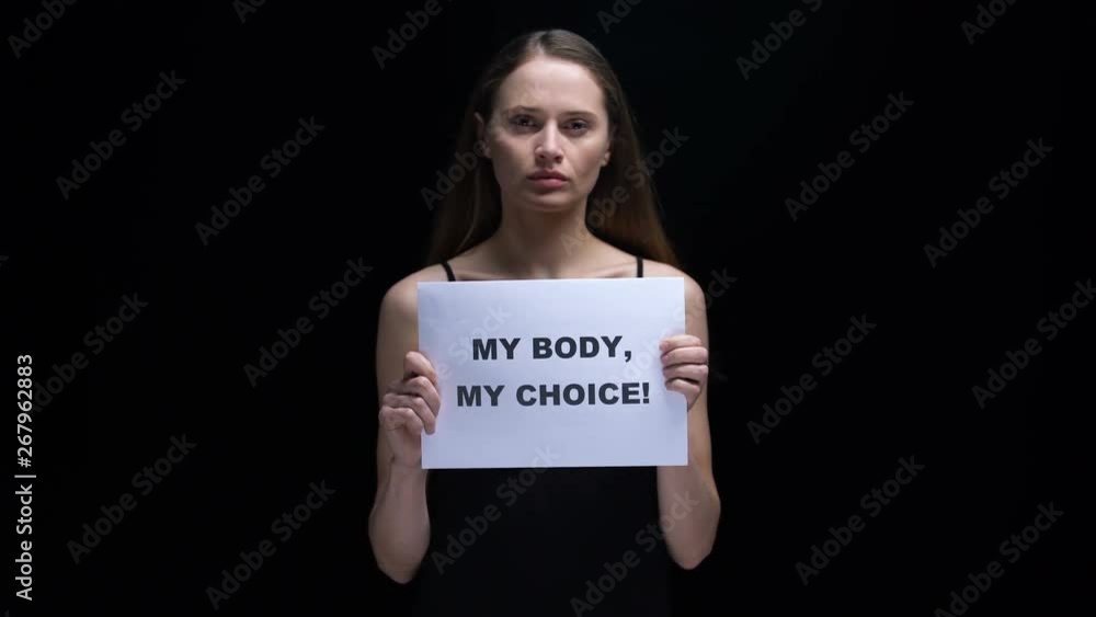 Woman showing my body my choice sign, body positivity, human rights ...