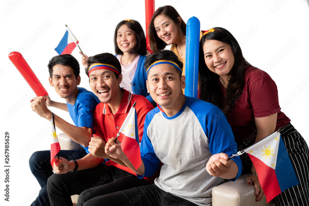 filipino group of people holding philippines flag celebrating ...