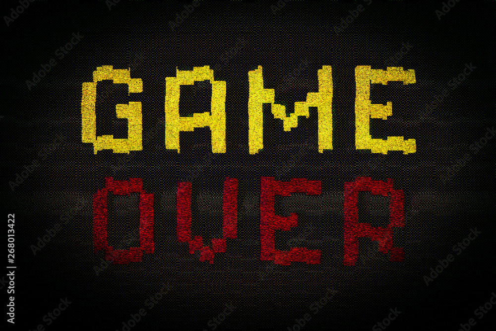 An overly distorted Game Over screen, yellow and red over black, with ...