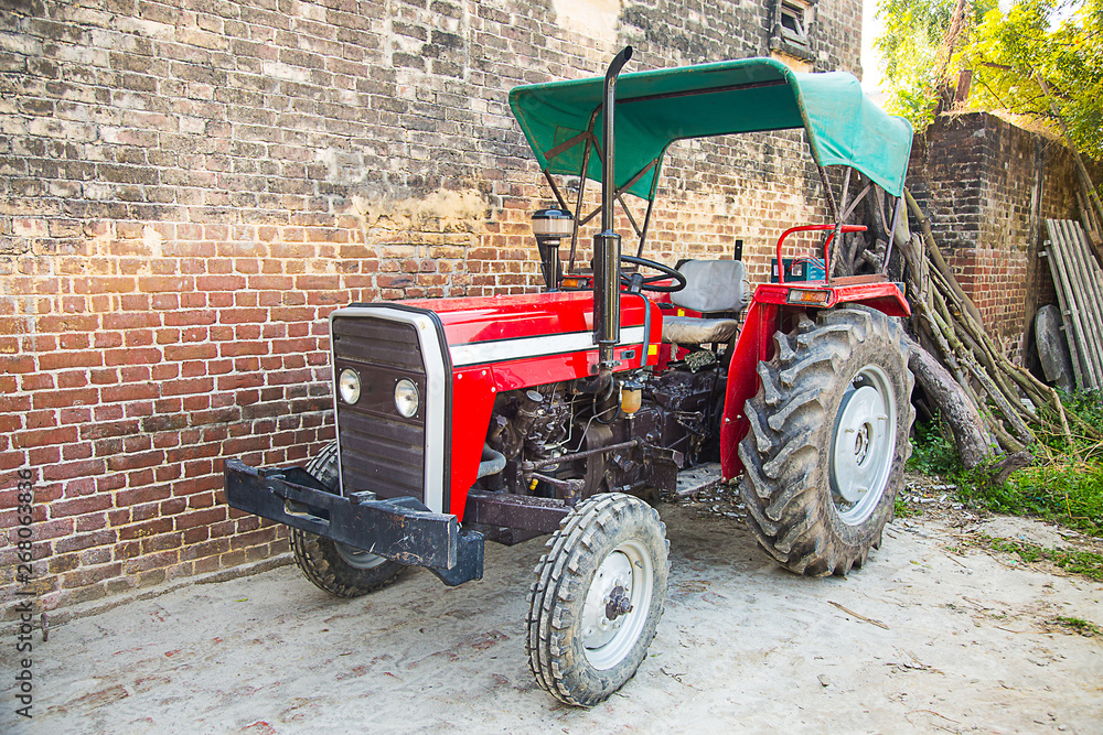 Red indian farming Tractor used for land, sowing, cultivator ...
