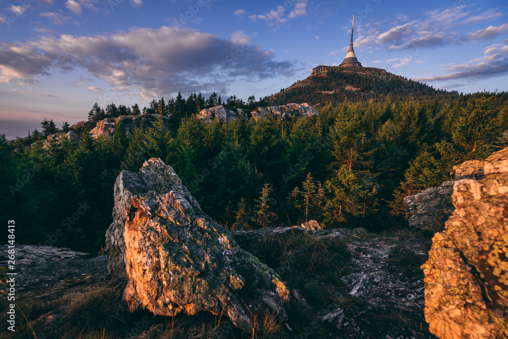 Foto Stock View of a sunrise or sunset landscape of Jizerske mountains and the top of Jested ...